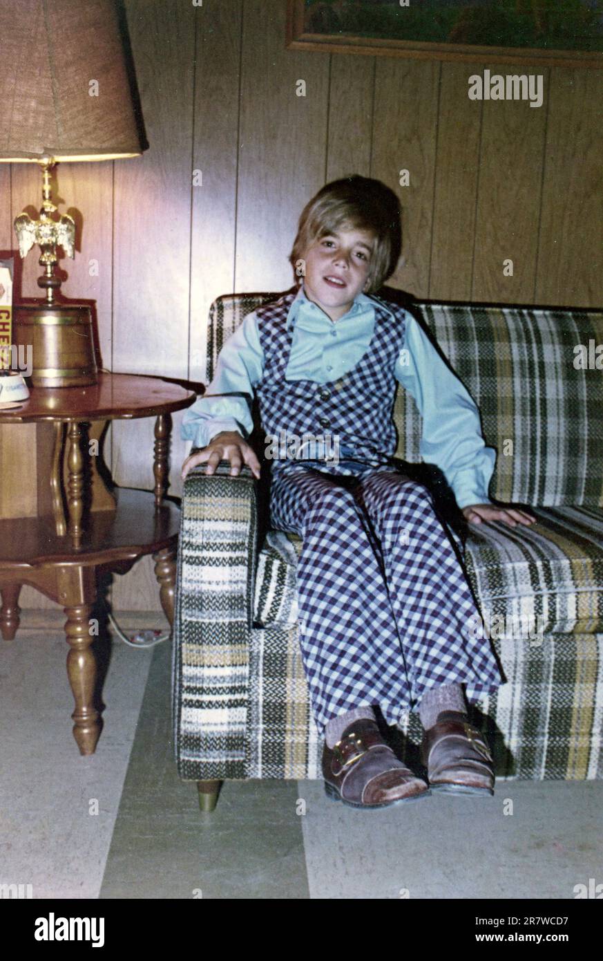 A boy poses in a strange looking suit, circa 1973 Stock Photo - Alamy