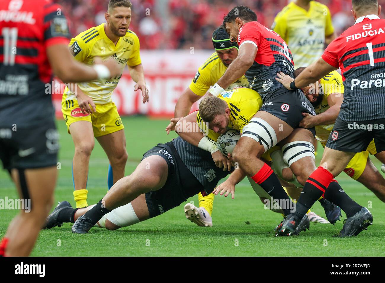 PARIS, FRANCE - JUNE 17: Pierre Bourgarit of Stade Rochelais is tackled ...