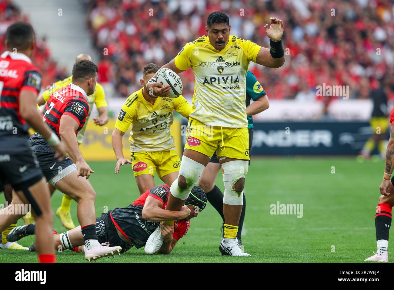 PARIS, FRANCE - JUNE 17: Francois Cros of Stade Toulousain tackles Will ...