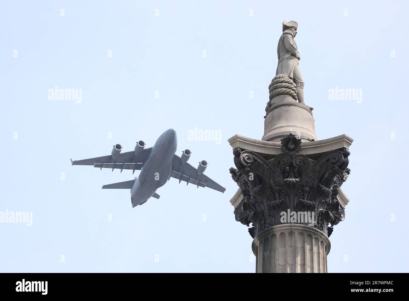 A Globemaster C-17 heavy lift transport plane is seen flying over ...