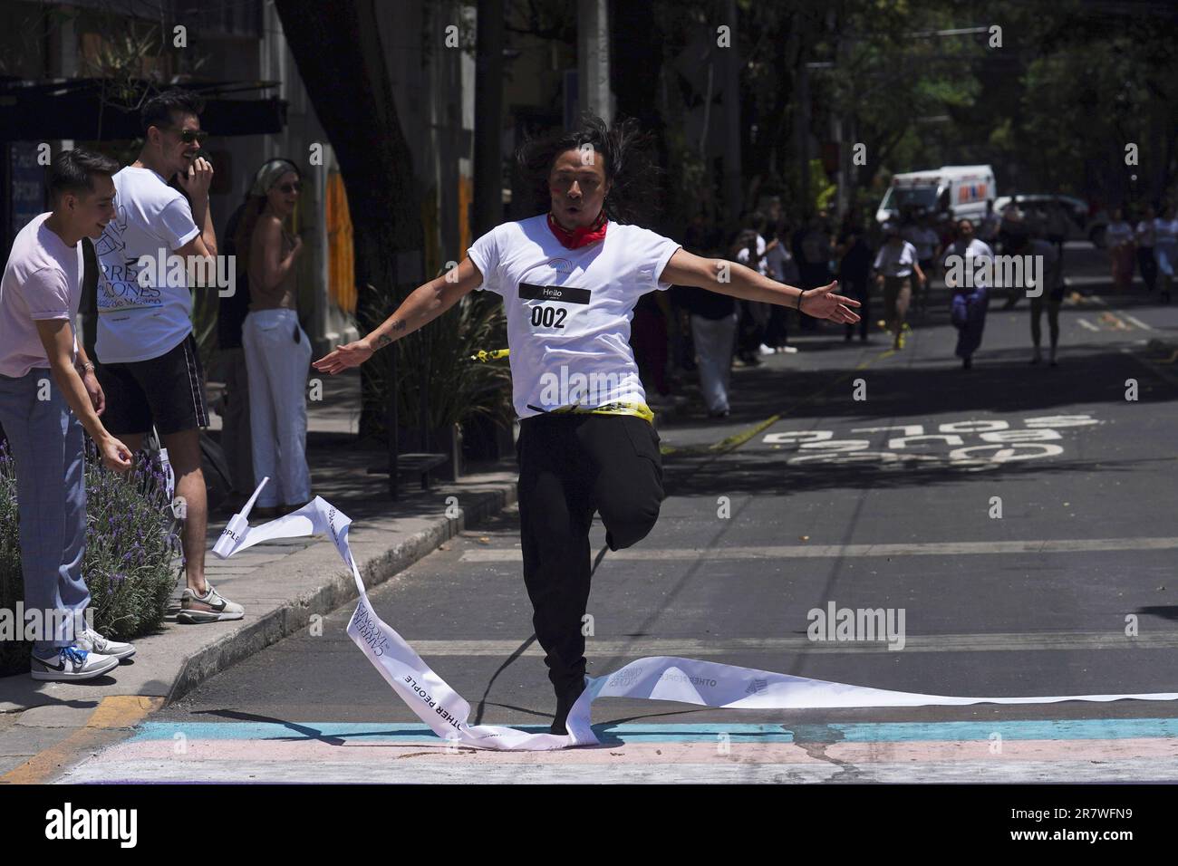Jorge Yasmin arrives at the finish line placing first in the high heels ...