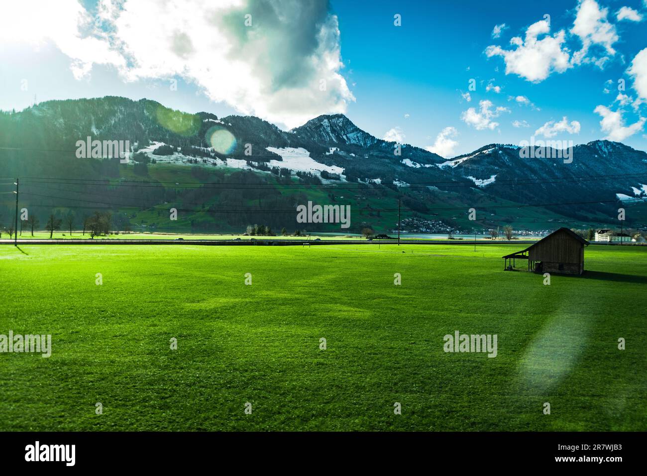 A breathtaking view of the majestic alpine mountains of Switzerland as ...