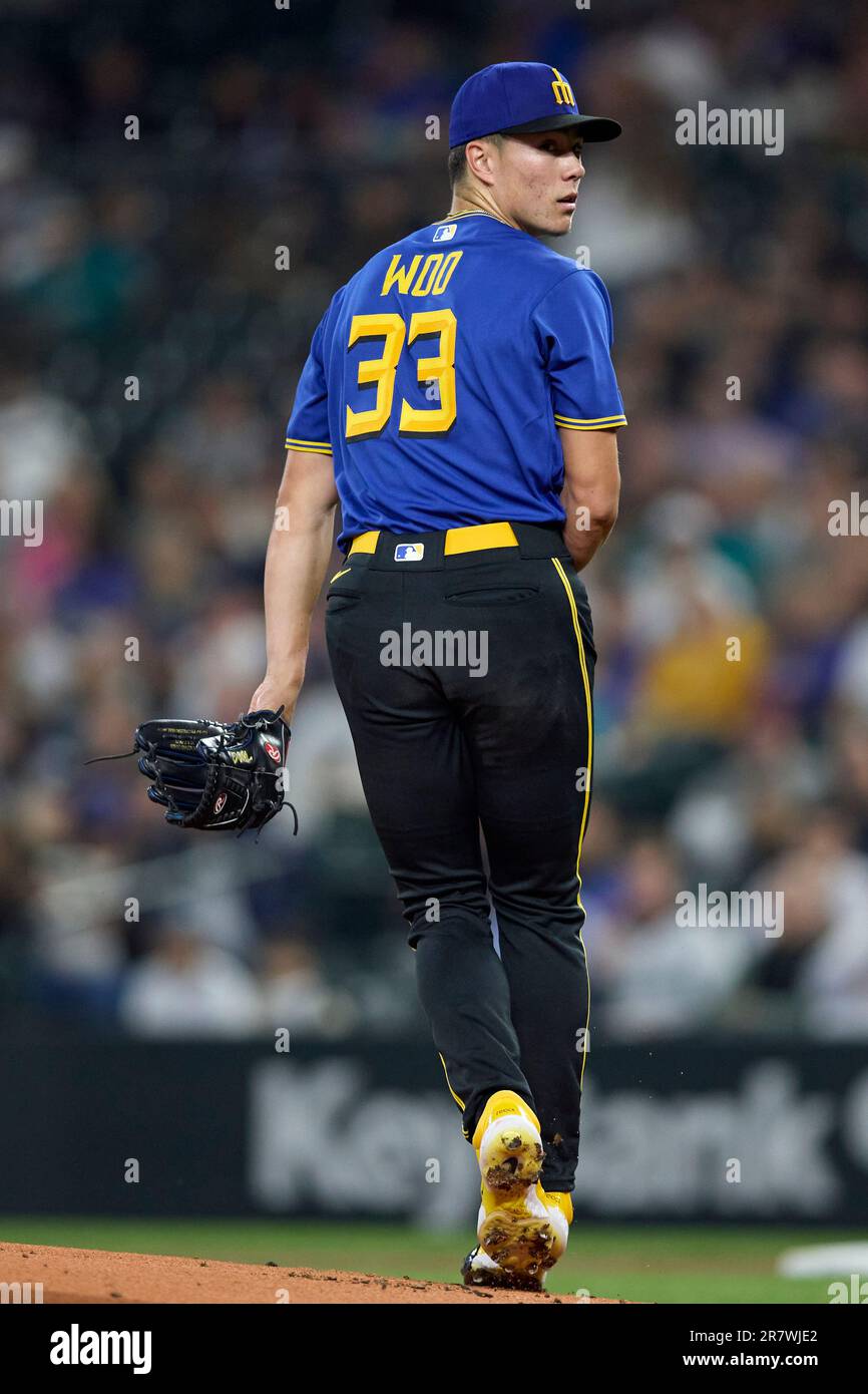 Seattle Mariners starting pitcher Bryan Woo walks the mound against a ...