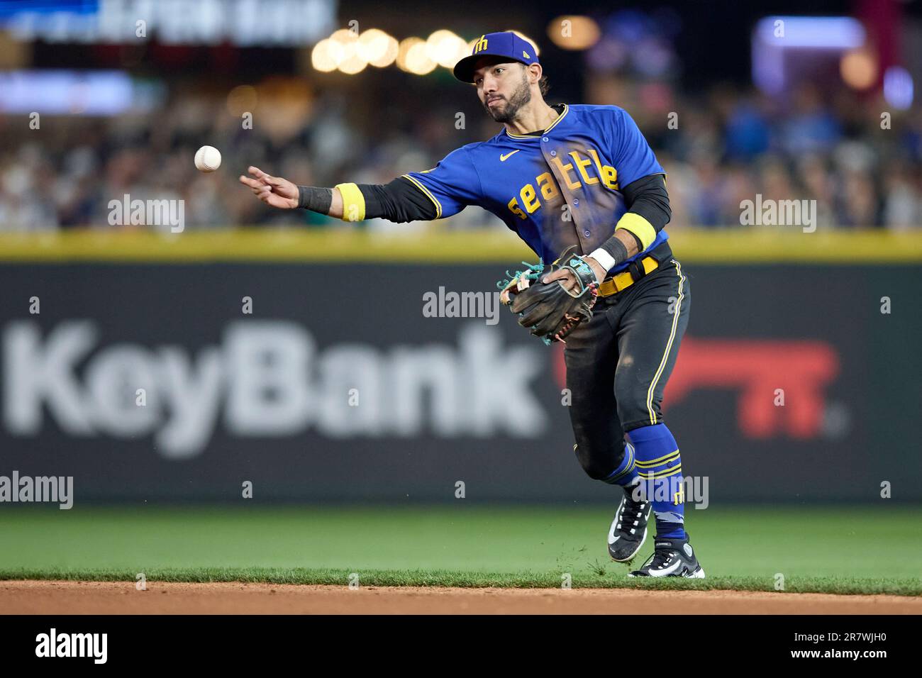 Seattle Mariners second baseman Jose Caballero throws to first after ...