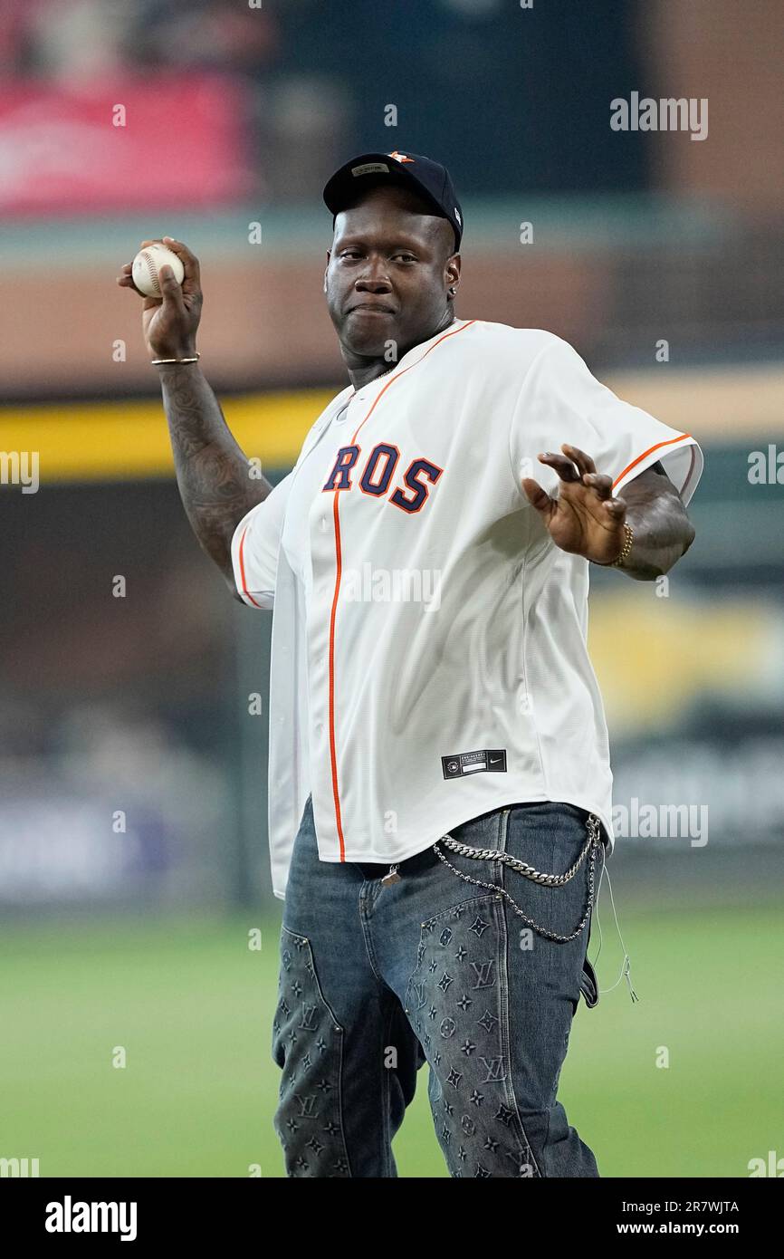 Houston Texans' Laremy Tunsil throws out a ceremonial first pitch ...