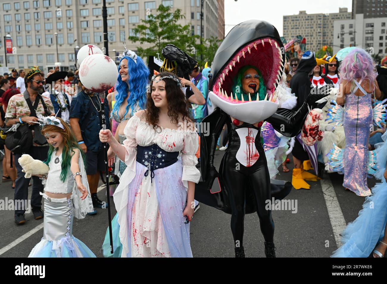 People dressed in costumes march in the 41st Annual Mermaid Parade in ...