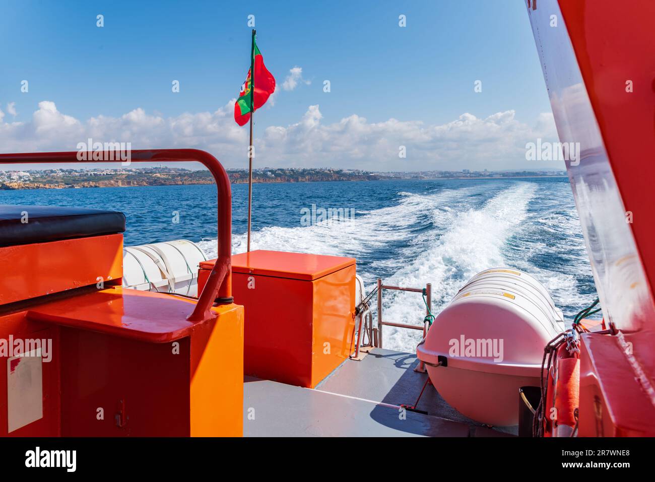 Rear view from the boat of a pleasure boat for tourists in the Algarve ...