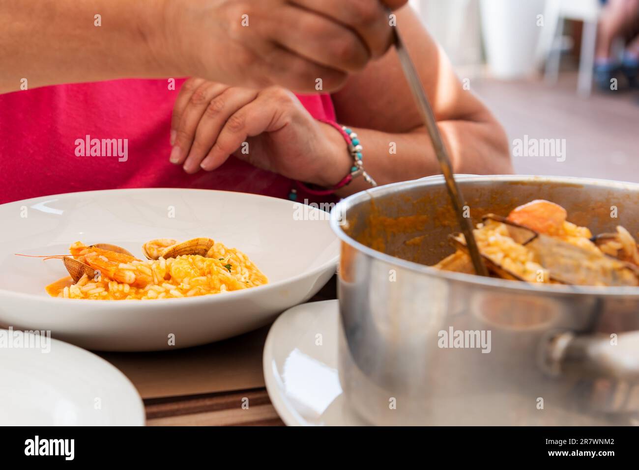 Woman pouring rice hi-res stock photography and images - Alamy