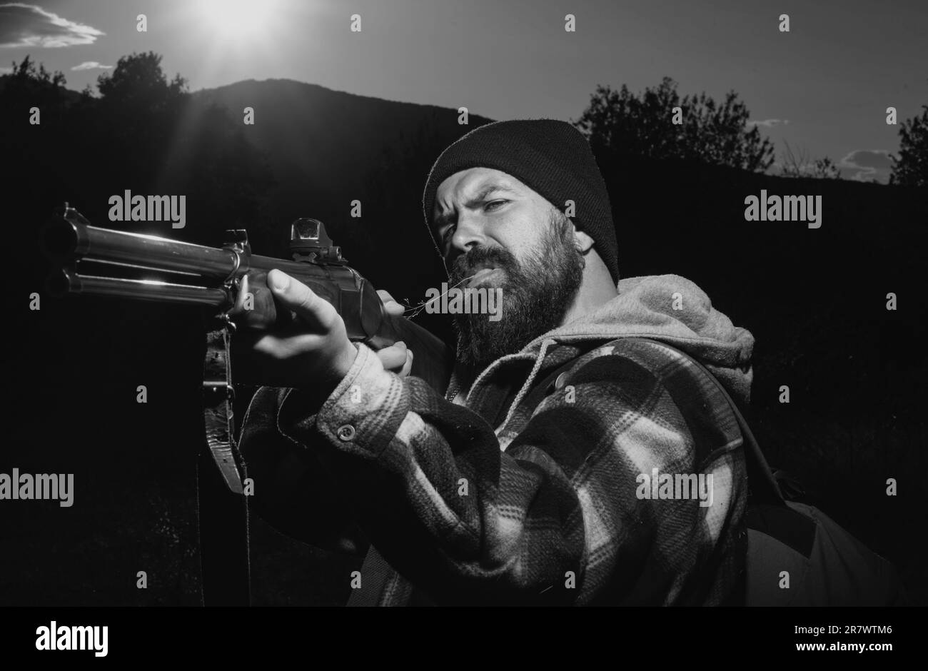 Bearded Hunter Man Holding Gun And Walking In Forest Rifle Hunter Silhouetted In Beautiful
