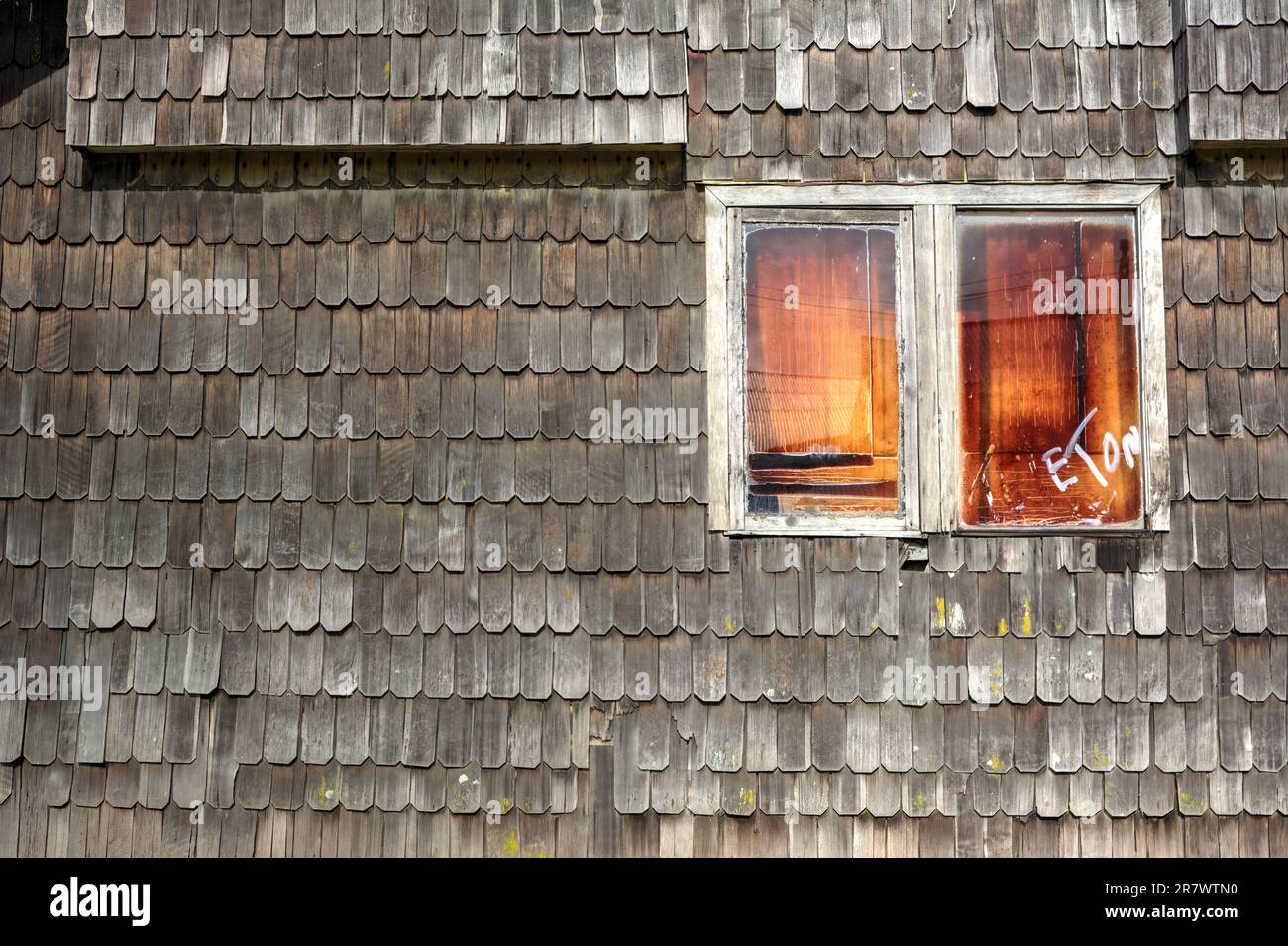Traditional wood shingles (Tejuela Chilota) on historic buildings on ...