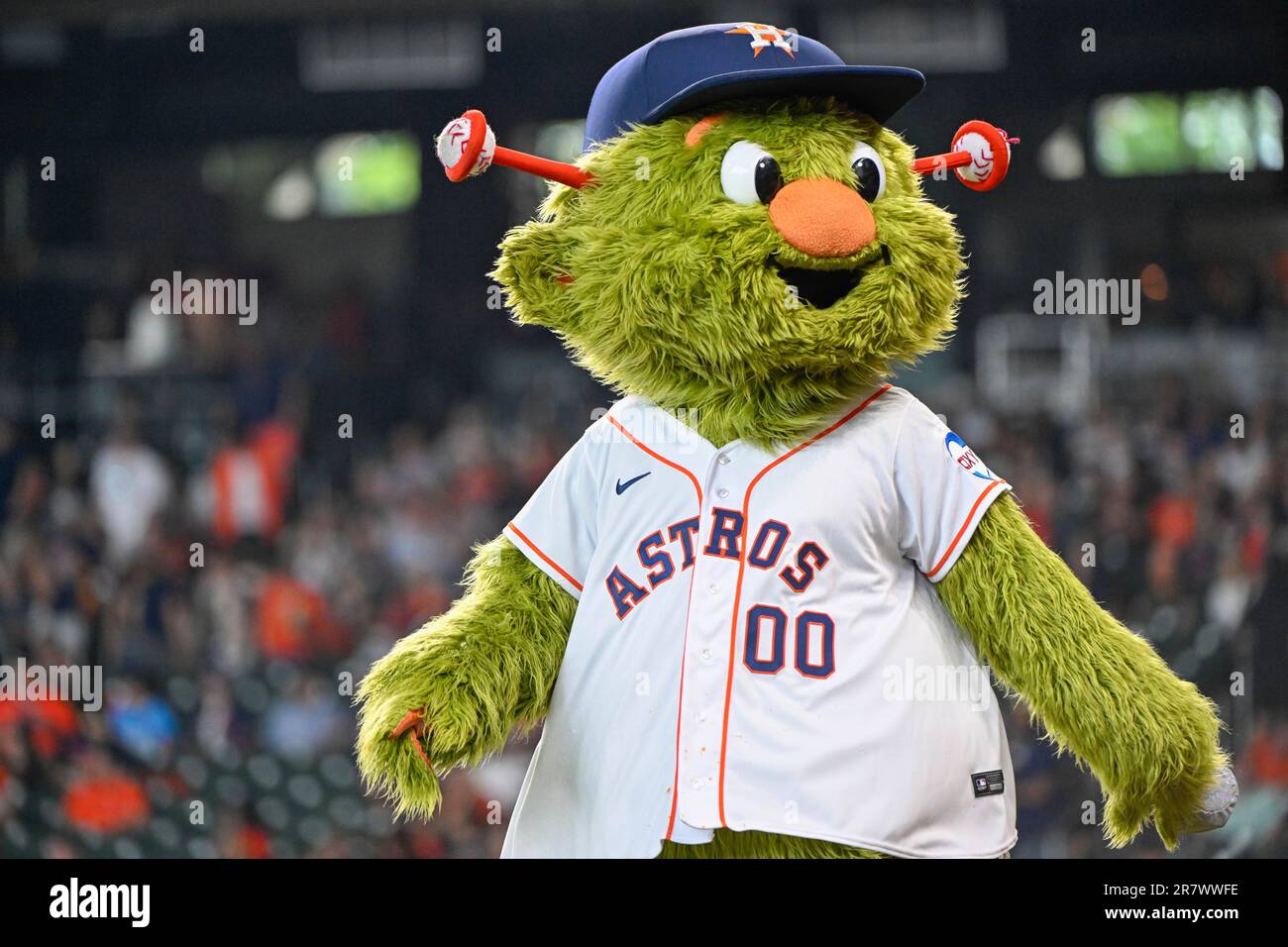 HOUSTON, TX - JUNE 17: Houston Astros mascot, Orbit revs up the crowd ...