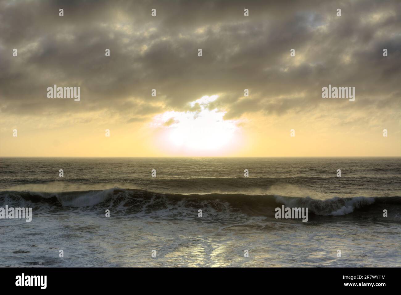 A stunningly beautiful sunset over the Pacific Ocean on the coast of ...