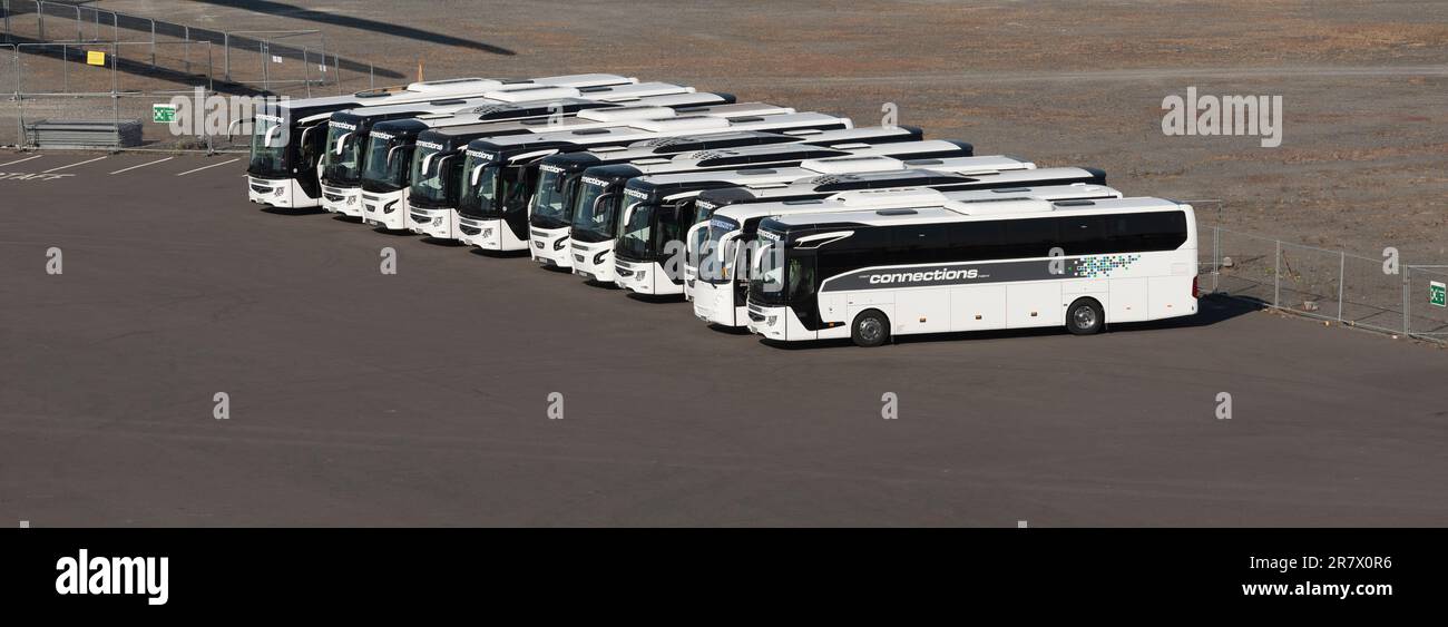 Belfast, Northern Ireland, UK. June 2023. White excursion coaches ...