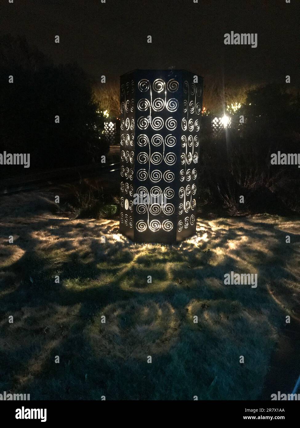 This image features a light emanating from behind a circularly shaped ...