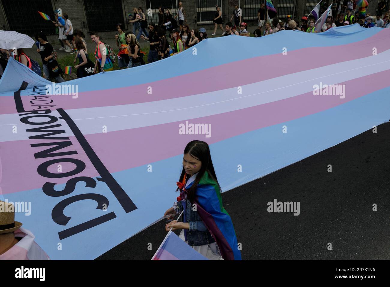 Warsaw, Poland. 17th June, 2023. Participants hold a huge flag during ...