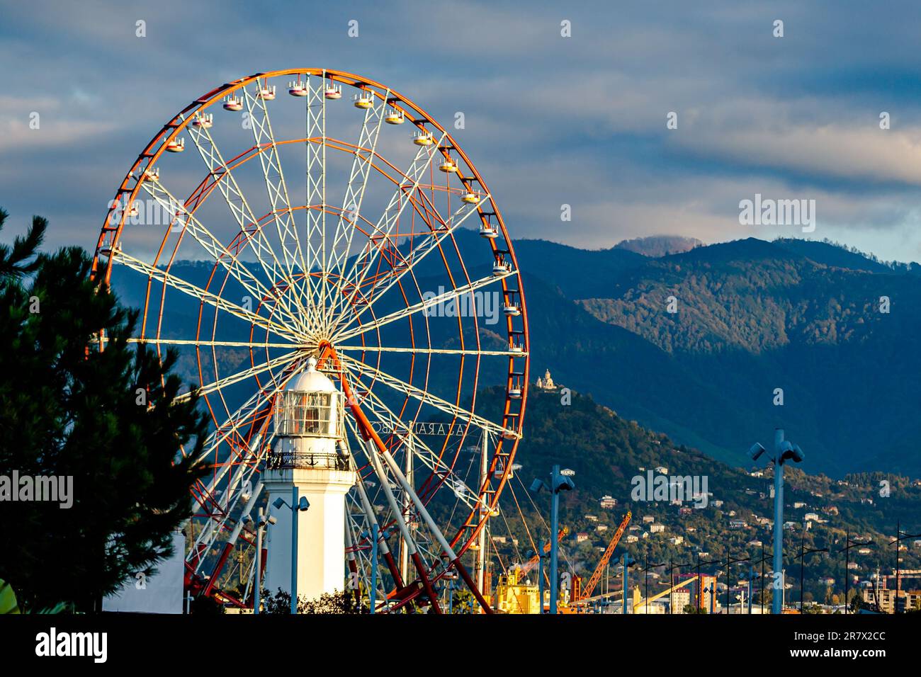 A stunning aerial view of a bright and vibrant ferris wheel situated in ...