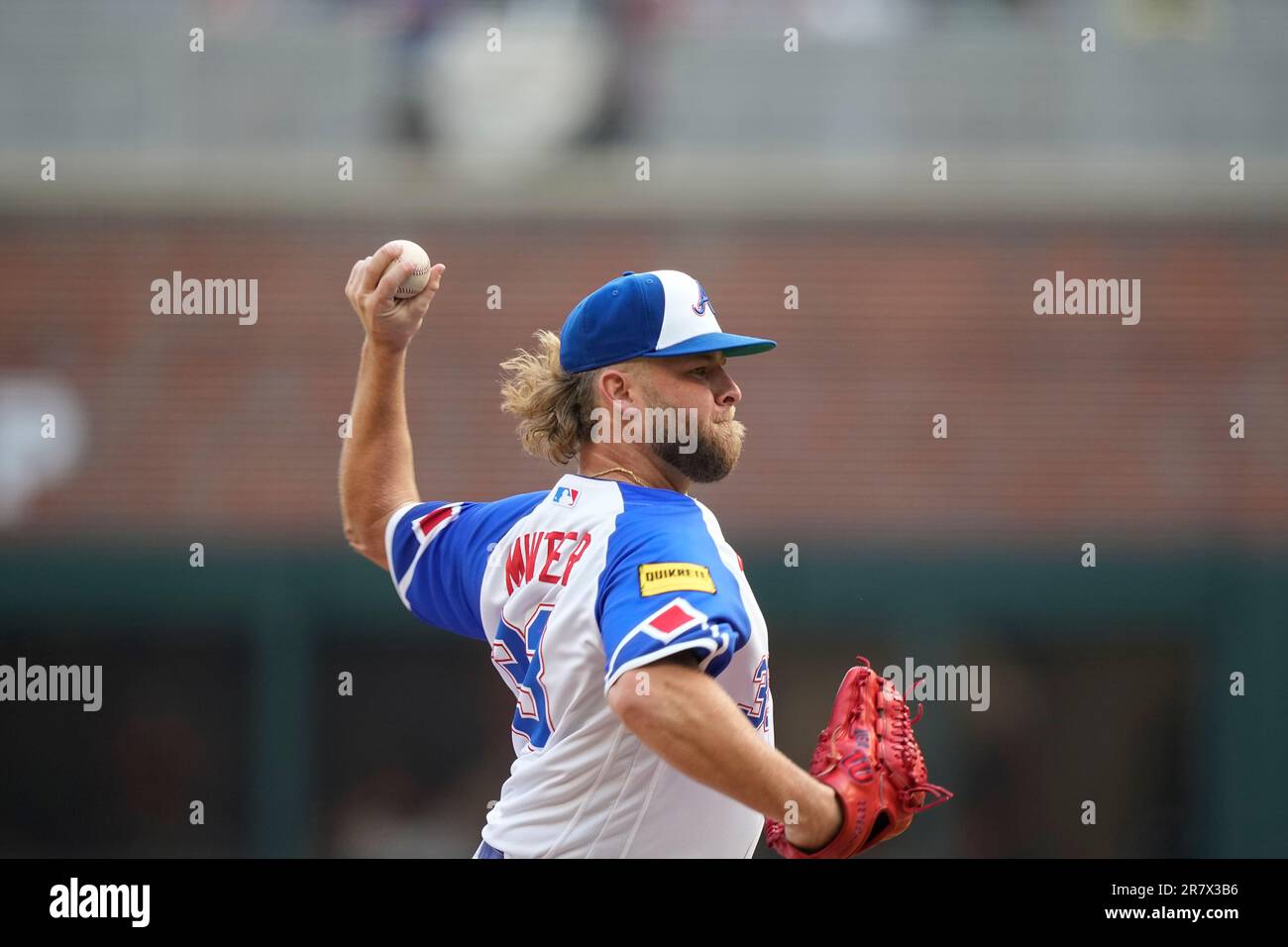 Atlanta Braves relief pitcher A.J. Minter (33) plays a baseball game ...