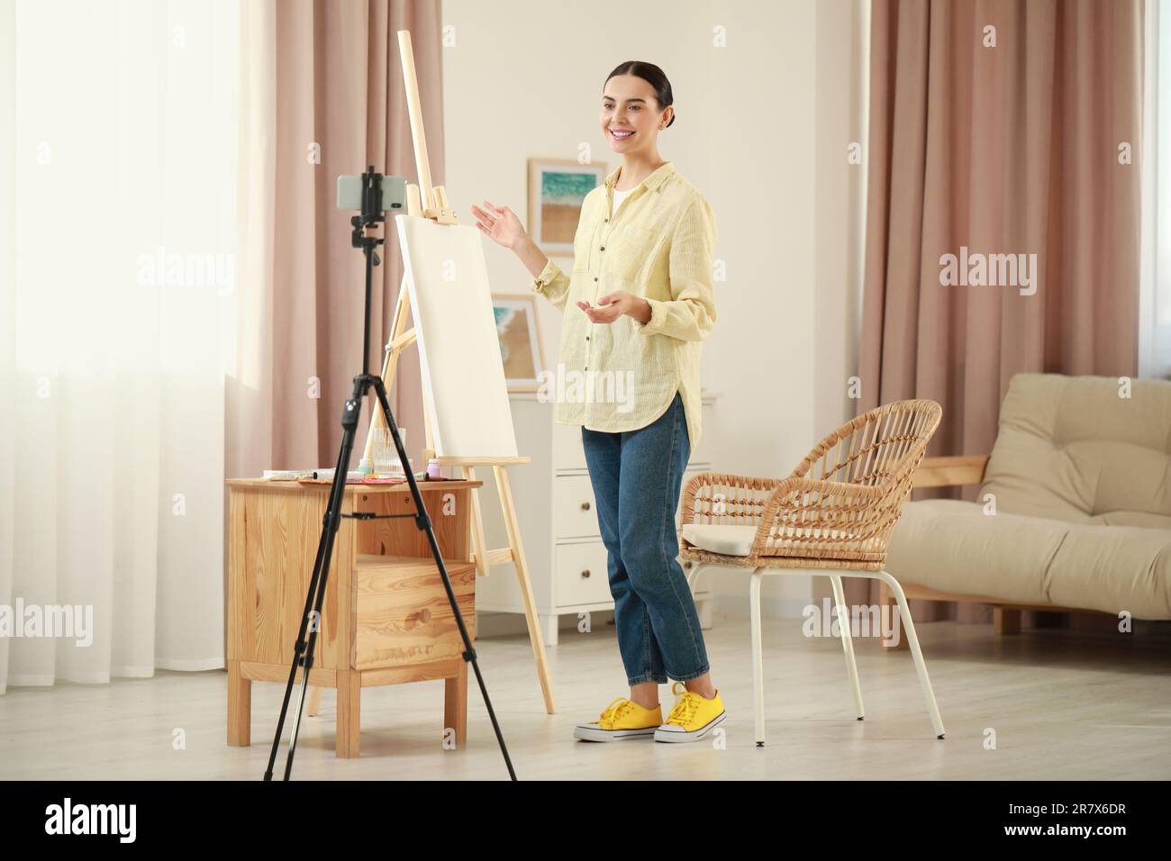 Teacher conducting online painting lesson at home. Time for hobby Stock ...