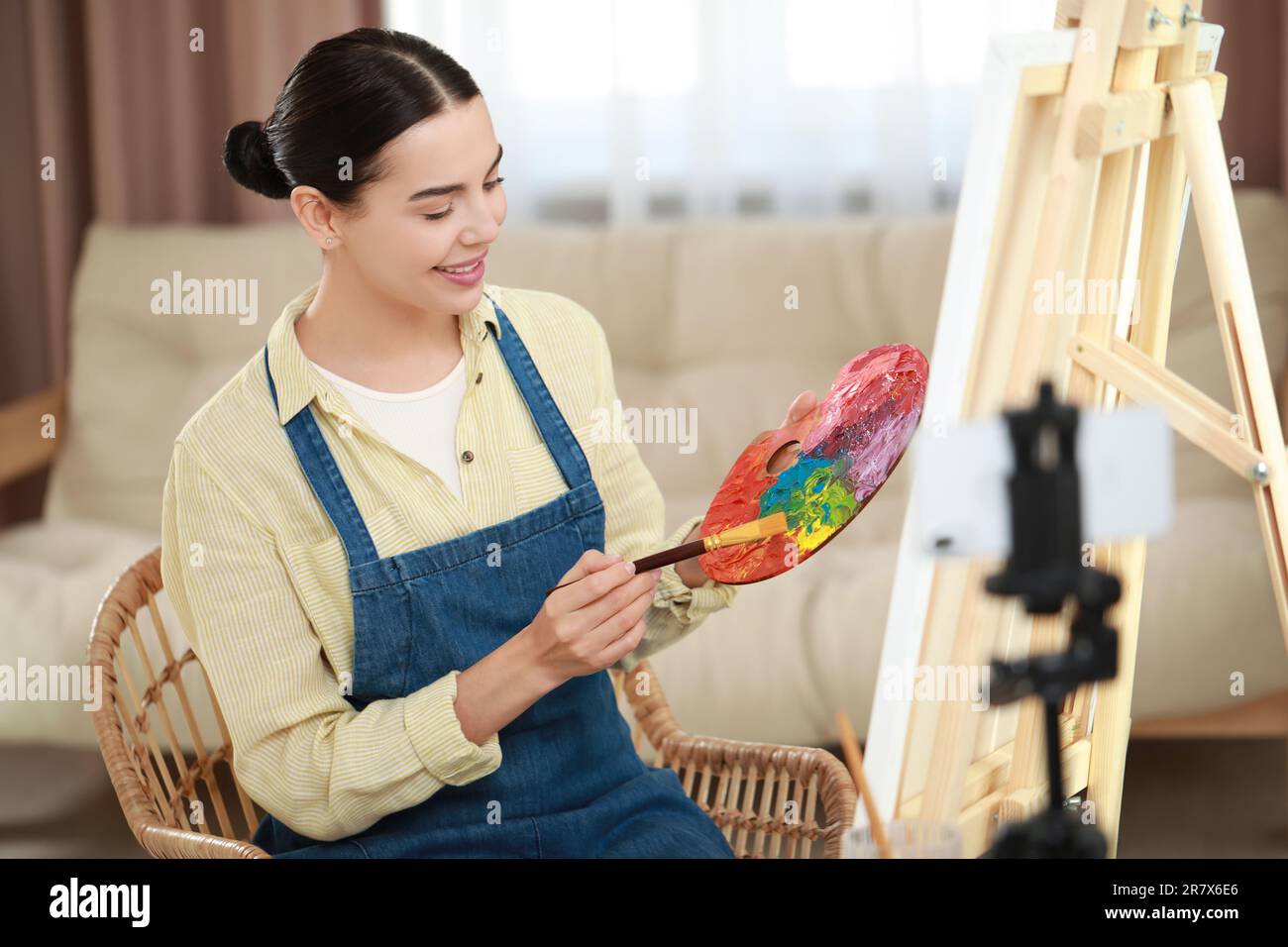 Teacher conducting online painting lesson at home. Time for hobby Stock ...