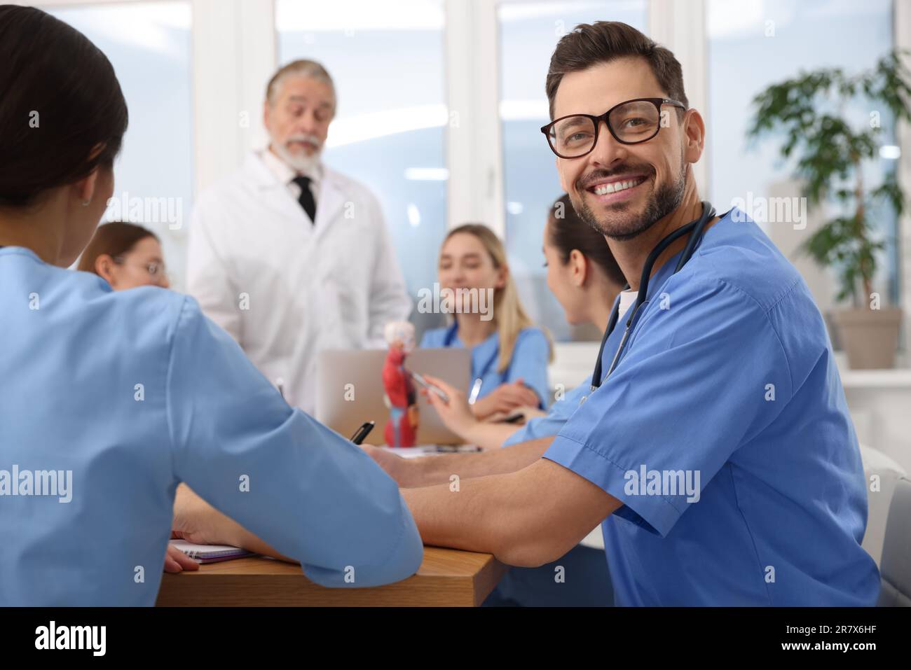Portrait of young intern wearing uniform on lecture in university Stock ...