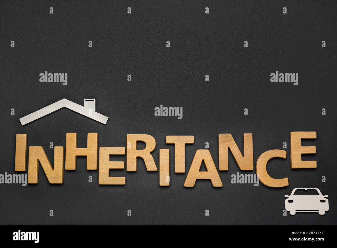 Word Inheritance made with wooden letters and different cutouts on ...