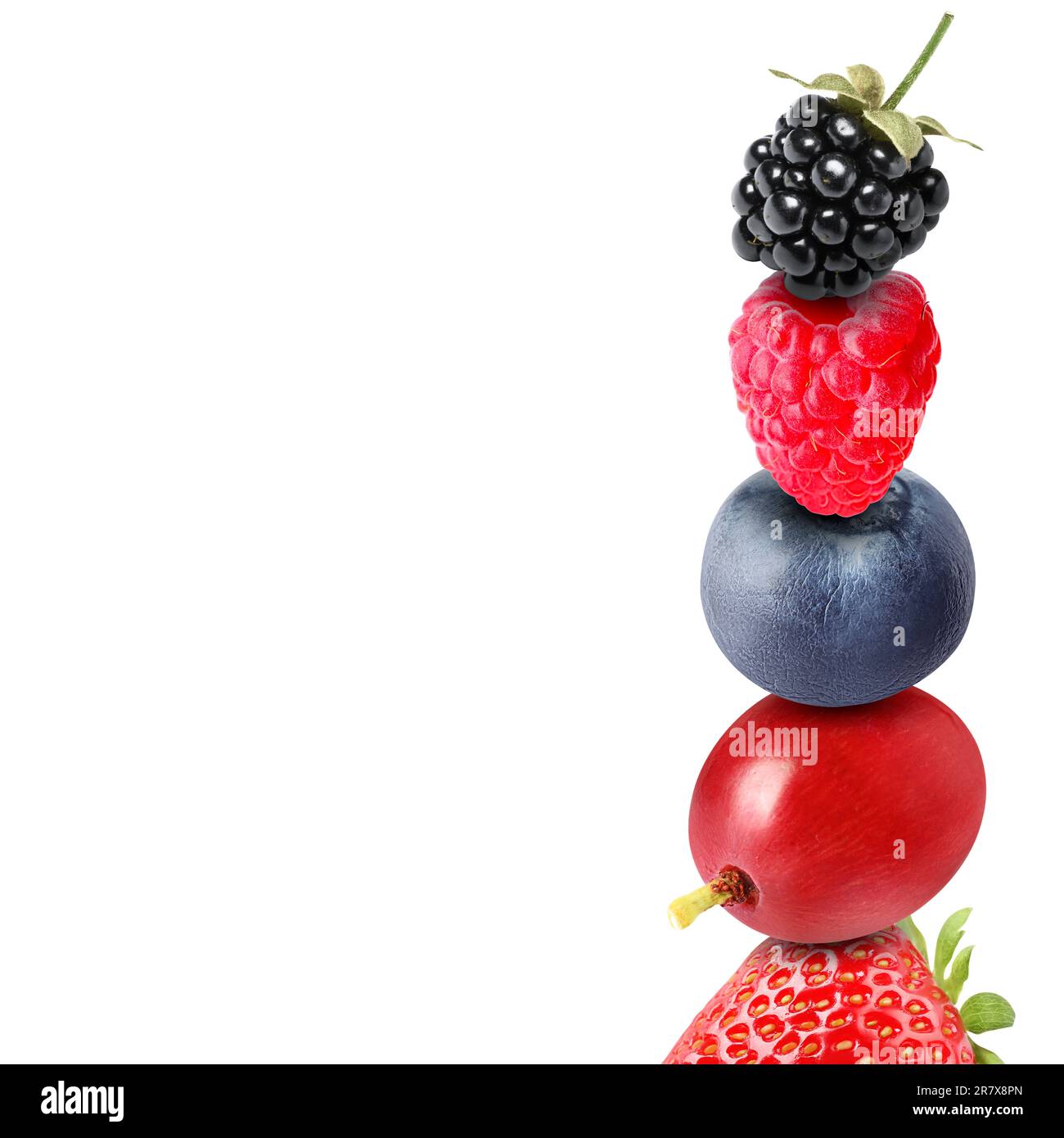 Stack of different fresh tasty berries on white background Stock Photo ...