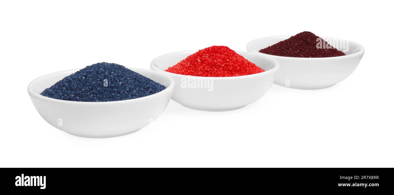Bowls with food coloring on white background Stock Photo - Alamy