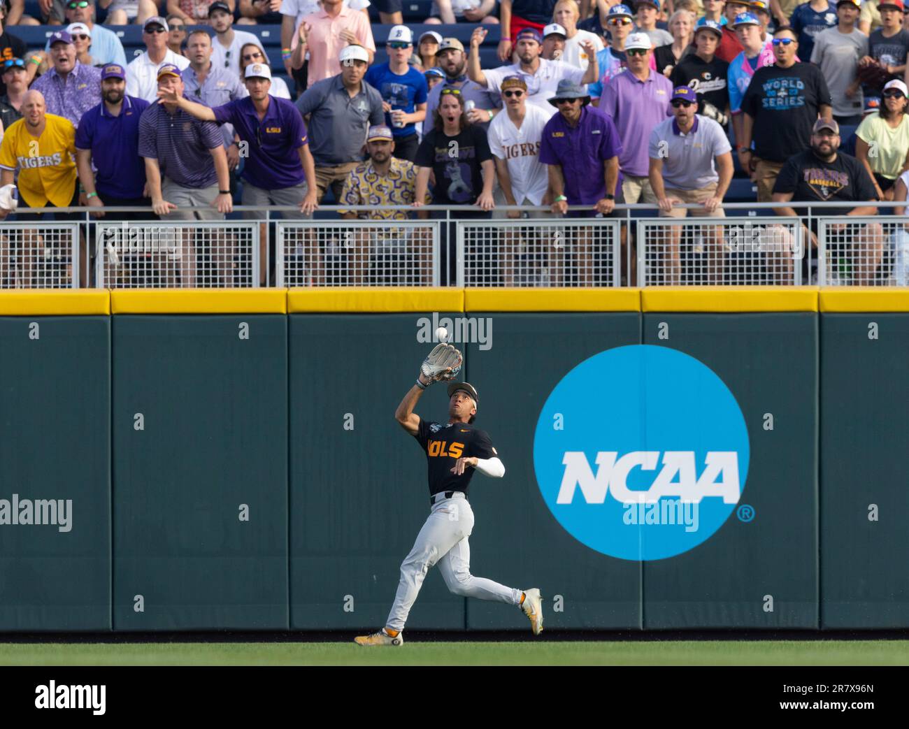 Tennessee's Christian Scott catches a fly ball in center field hit by ...