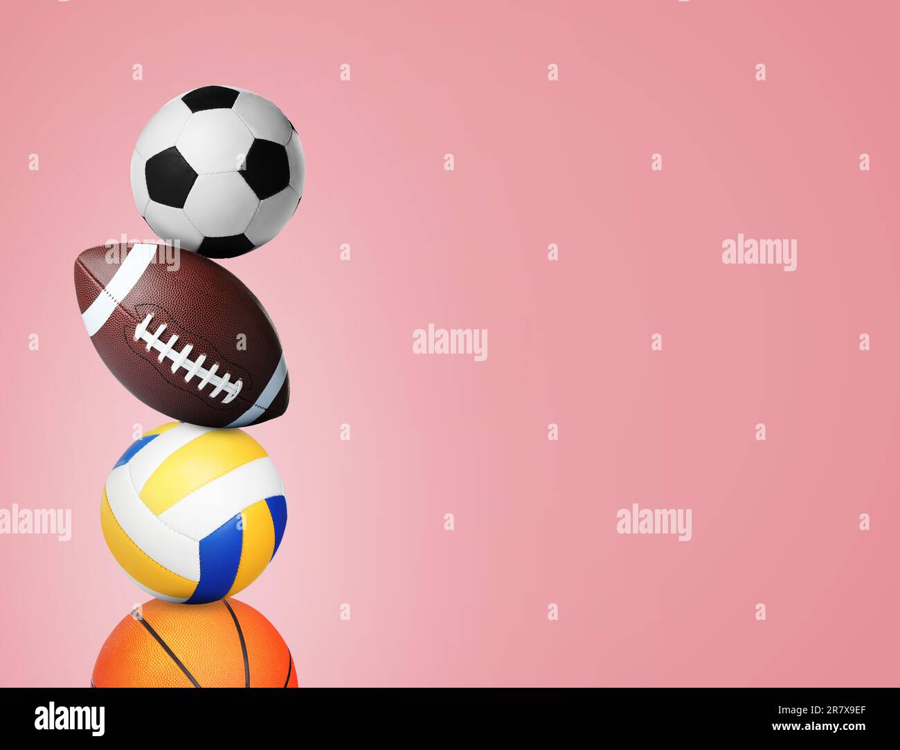 Stack of different sport balls on pink background, space for text Stock ...