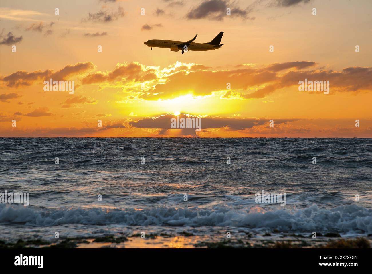 Airplane Flying Over Ocean