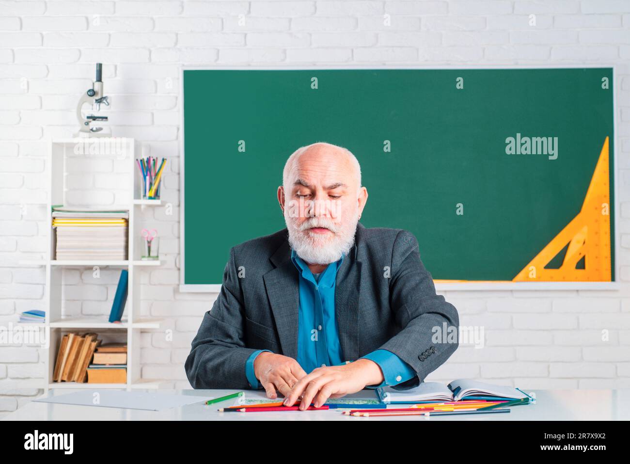 Professor in classroom at the school. A teacher who works ...