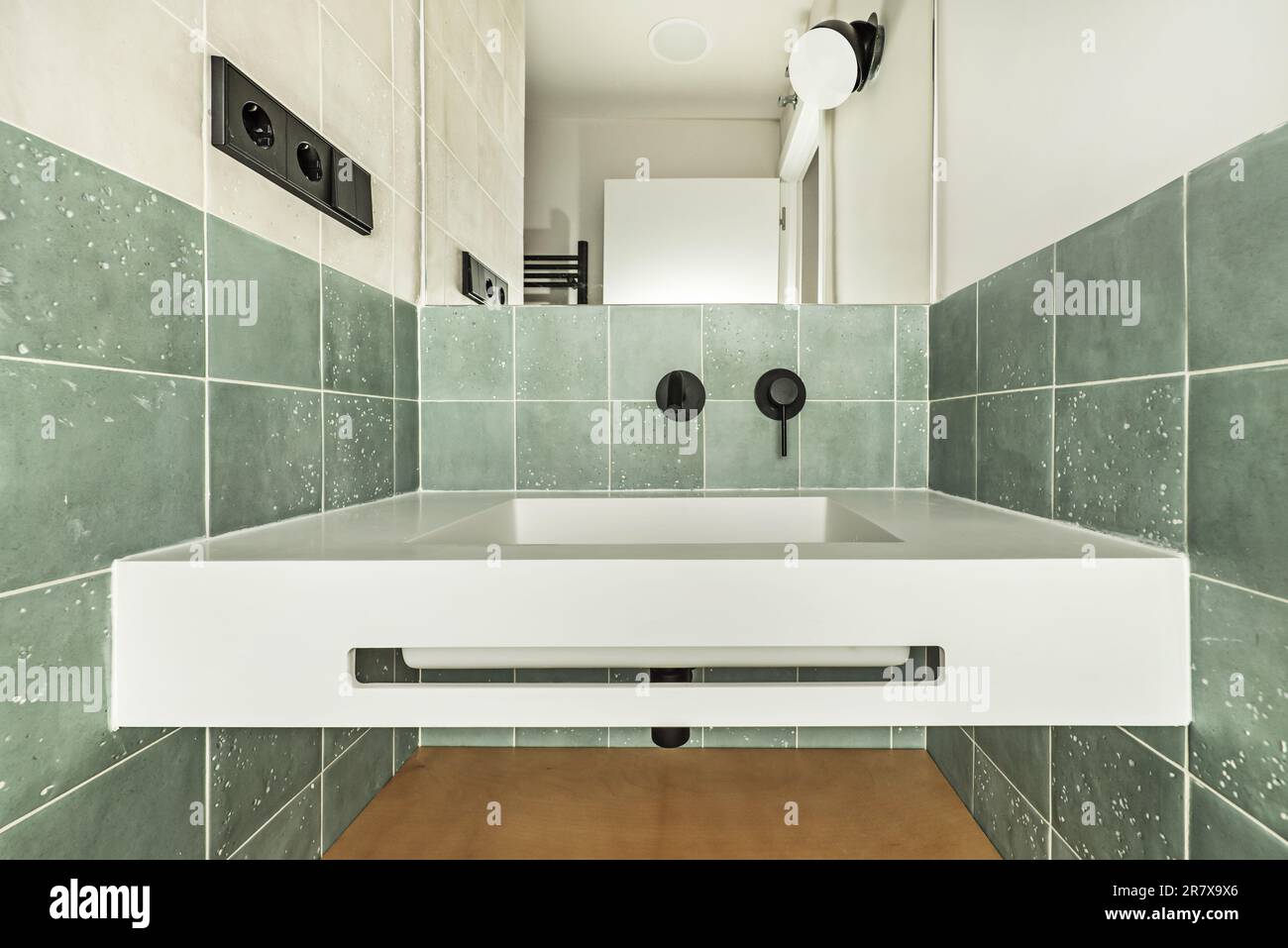 Front image of a small bathroom of a house with contemporary decoration ...