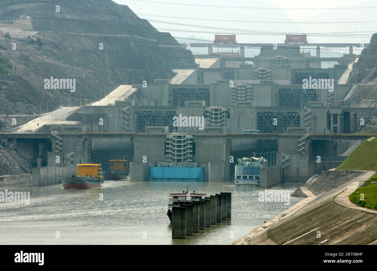 Ships traverse the locks at the Three Gorges Dam on the Yangtze River ...