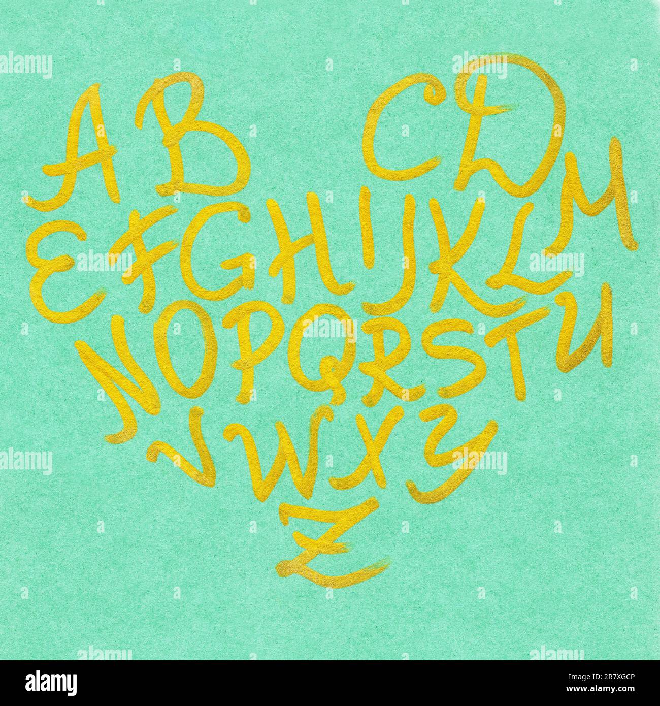 Alphabet heart shaped gold golden on green lettering typography set ...