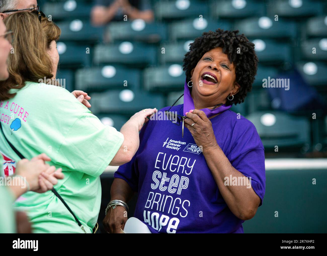 Joyce Lively, of Bowling Green, laughs as she receives her survivor ...