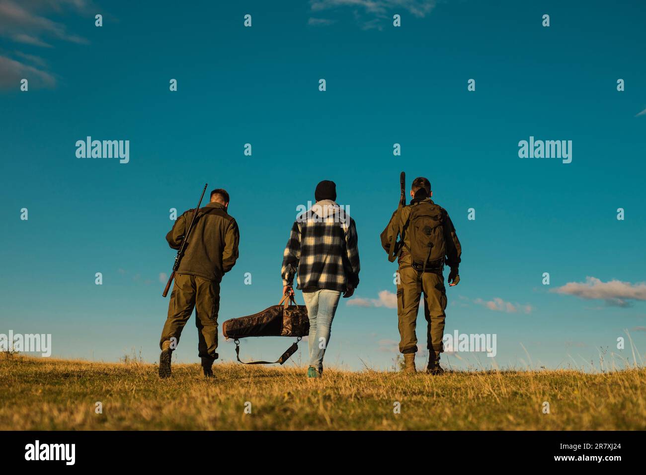 American hunting rifles. Hunting without borders. Hunter with shotgun ...