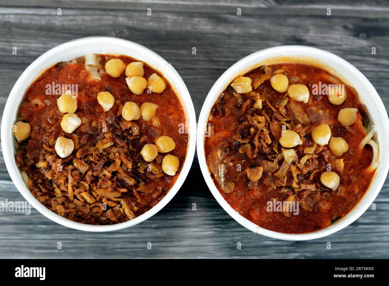 Egyptian cuisine of Koshary, a popular street food made of rice ...