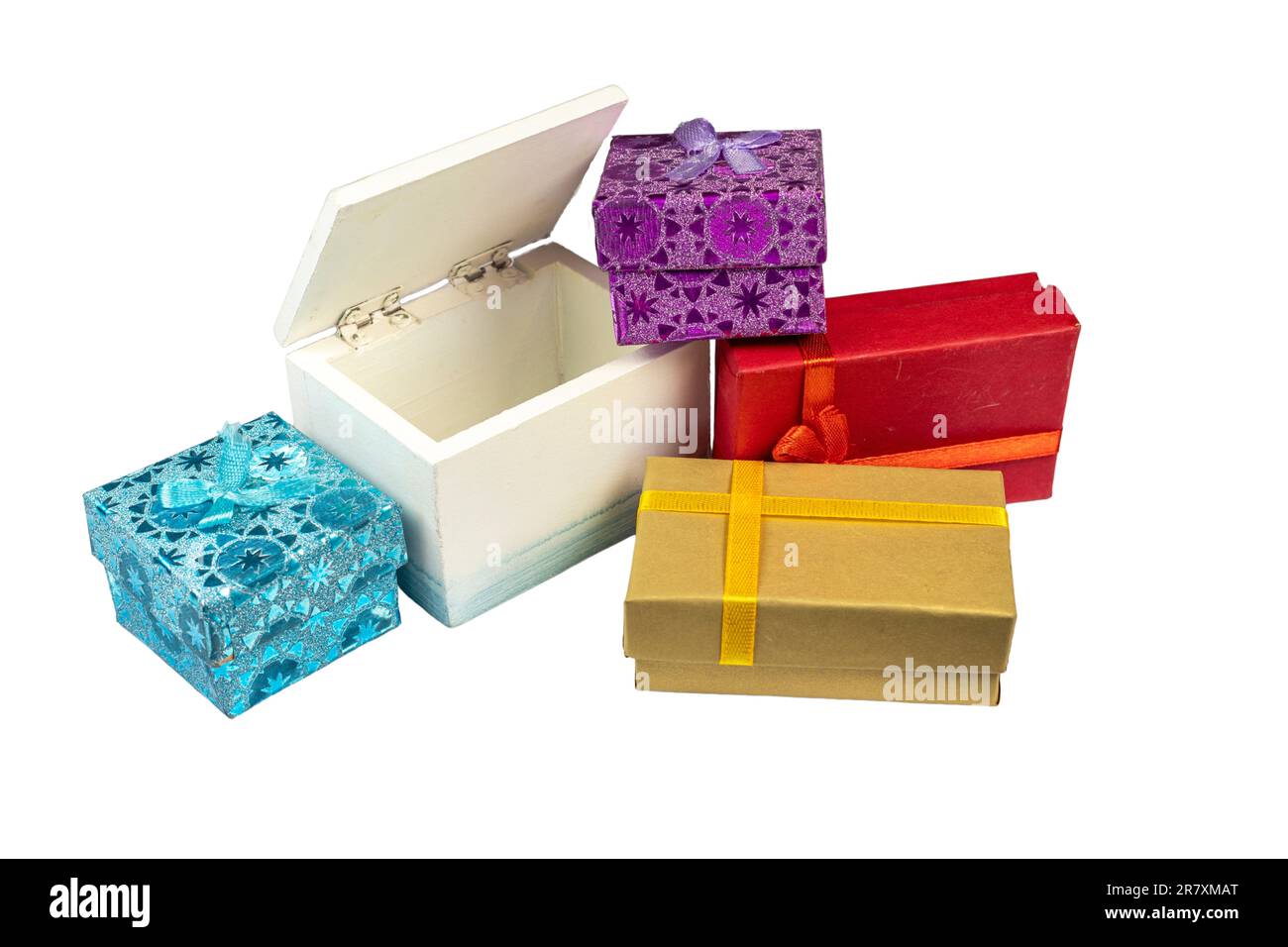 Gift boxes of various sizes and colors isolated on a white background ...