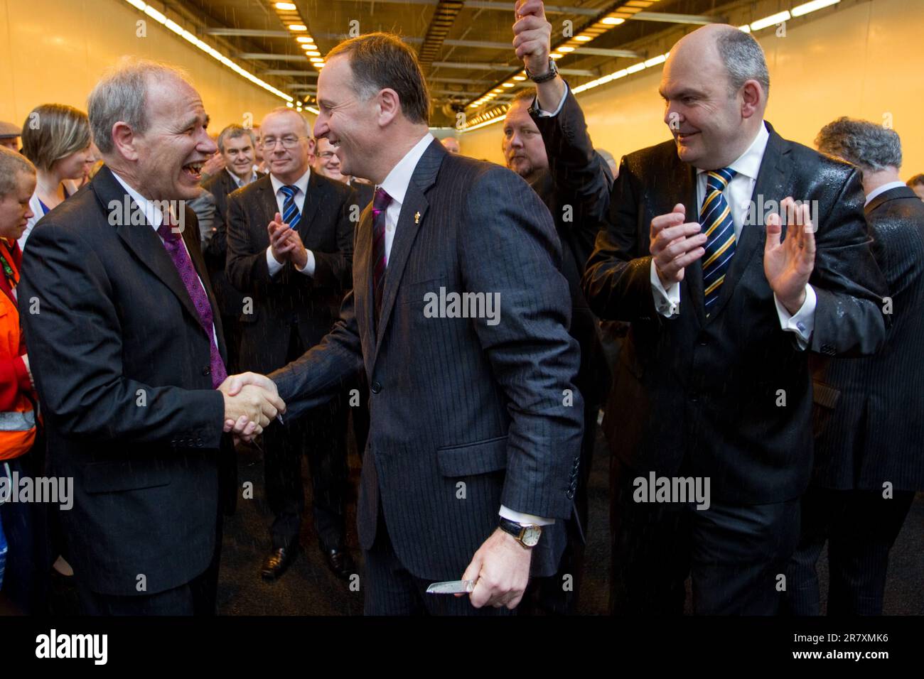 Auckland Mayor Len Brown, left, shakes hand with Prime Minister John ...