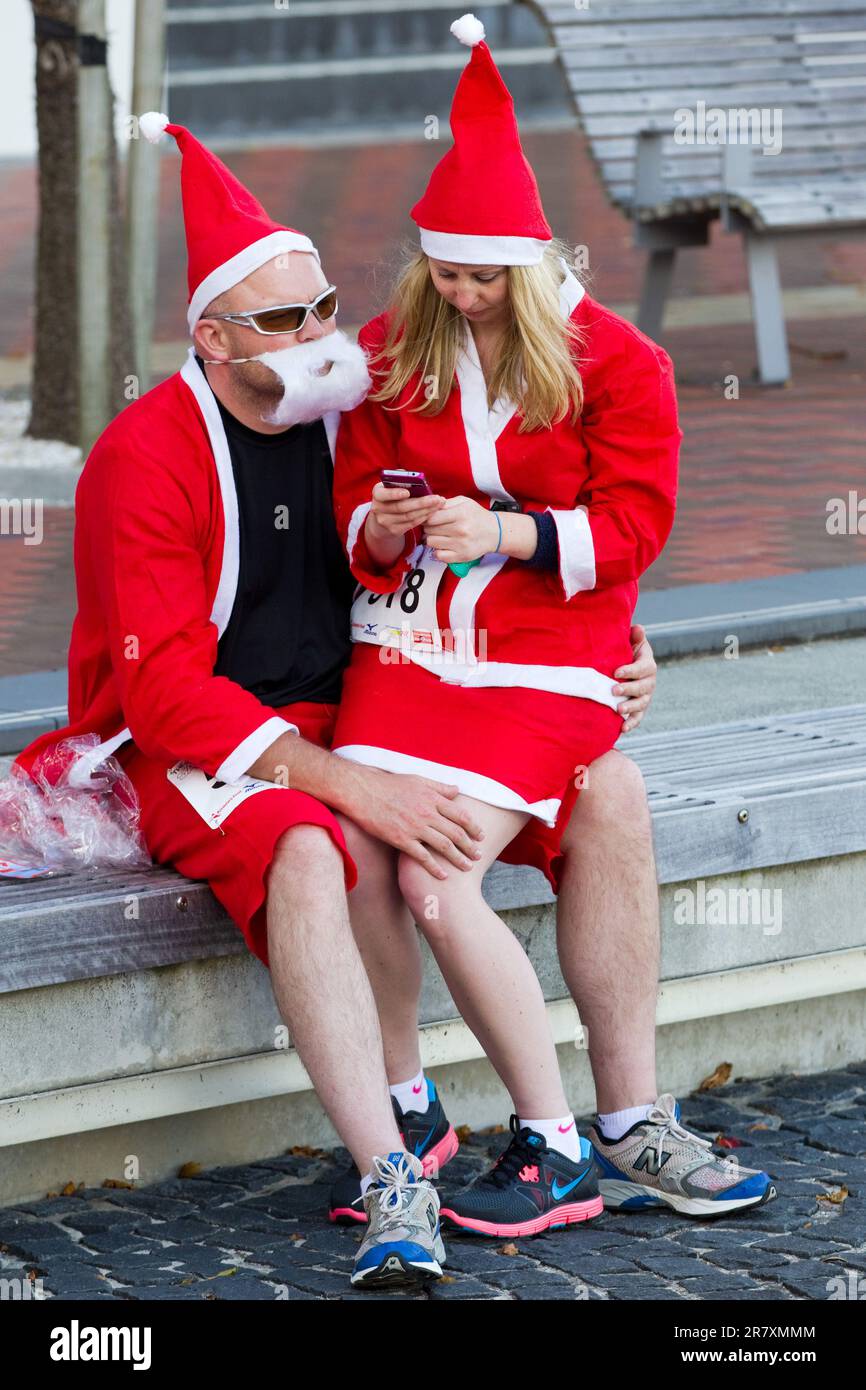 Two santas await the start of the KidsCan Great New Zealand Santa Run ...