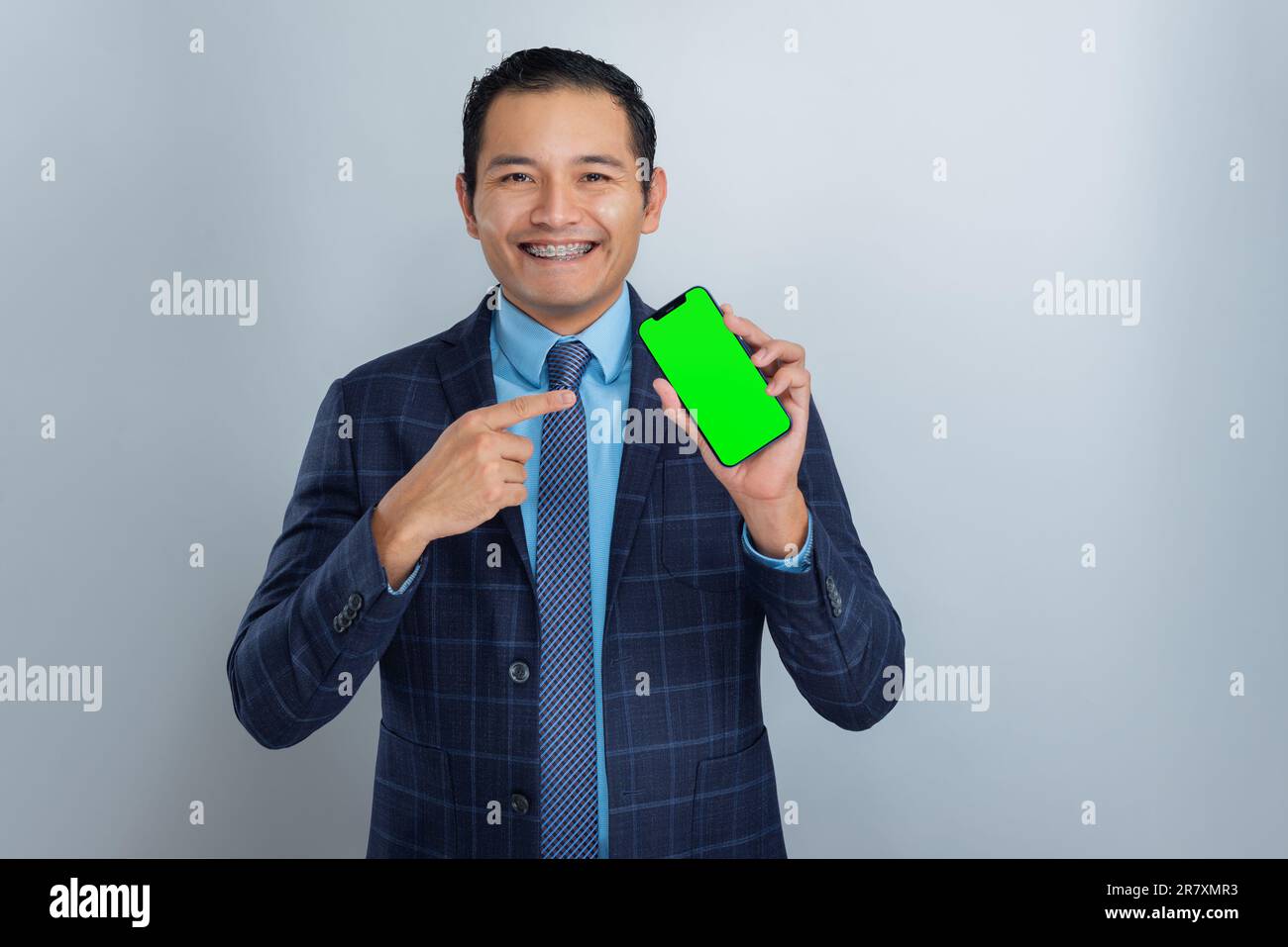 Young Mexican with brown skin dressed as an entrepreneur or businessman ...