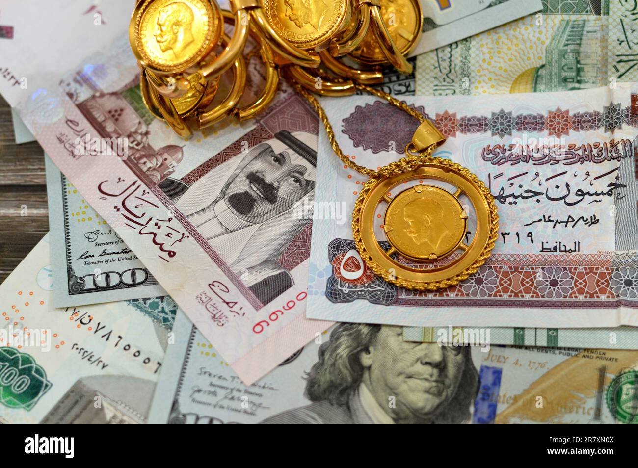 American dollars, Egyptian pounds and Saudi Arabia Riyals banknotes ...