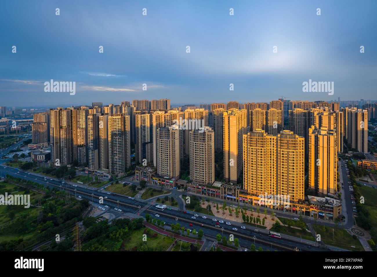 Sunrise sunlight shining on urban residential buildings Stock Photo - Alamy
