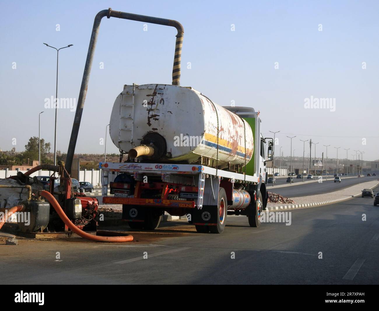 Cairo, Egypt, May 22 2023: preparations to place large water pipe parts ...