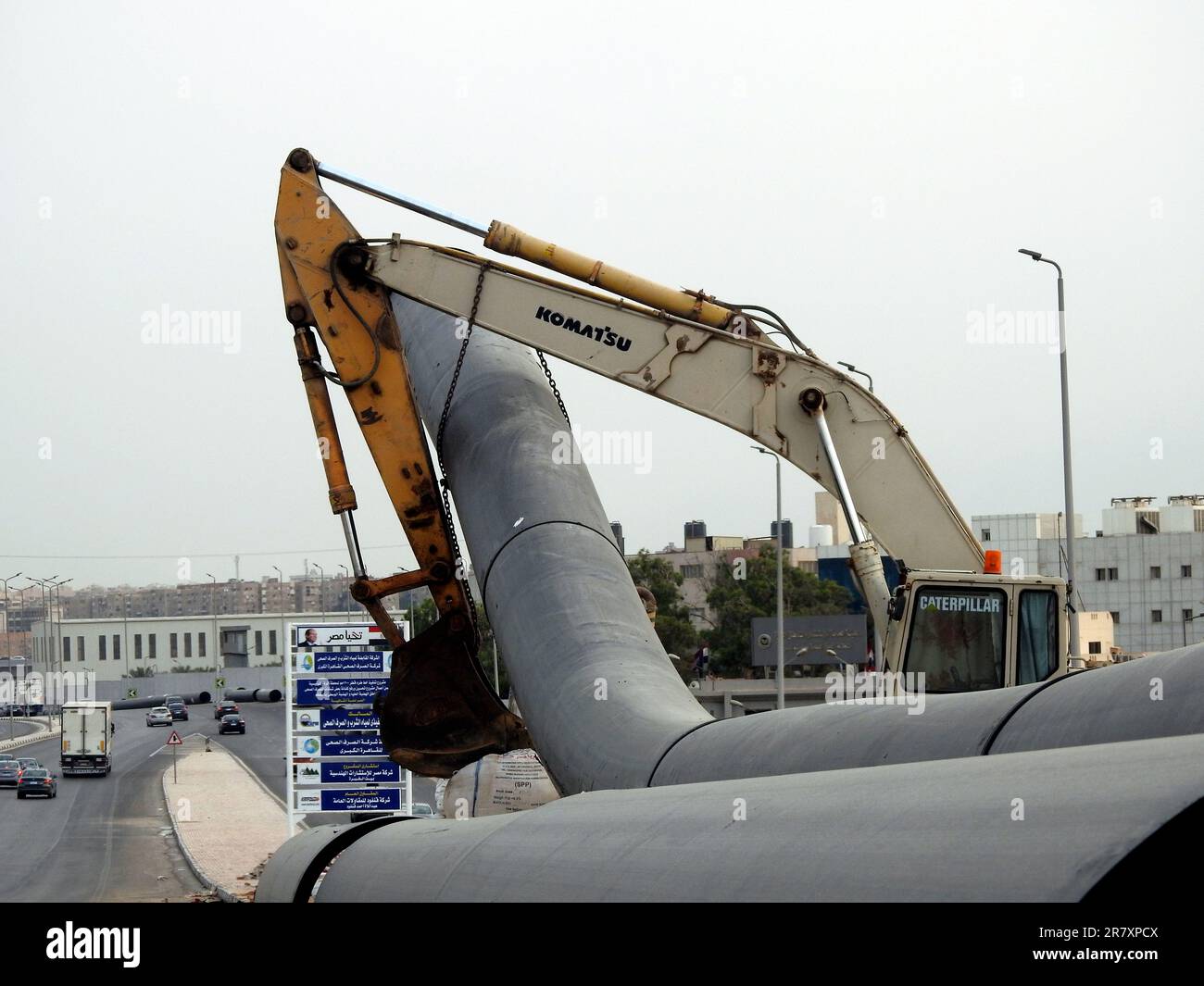 Cairo, Egypt, May 30 2023: preparations to place large water pipe parts ...