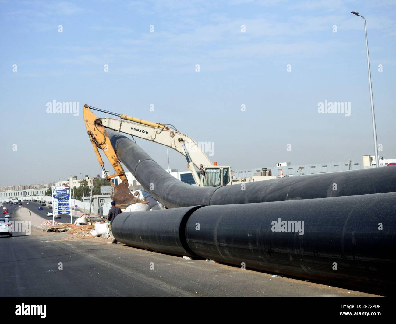 Cairo, Egypt, May 31 2023: preparations to place large water pipe parts ...