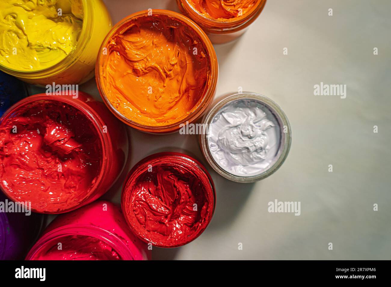 Top view various colors for shirt printing packed in glass bottles ...