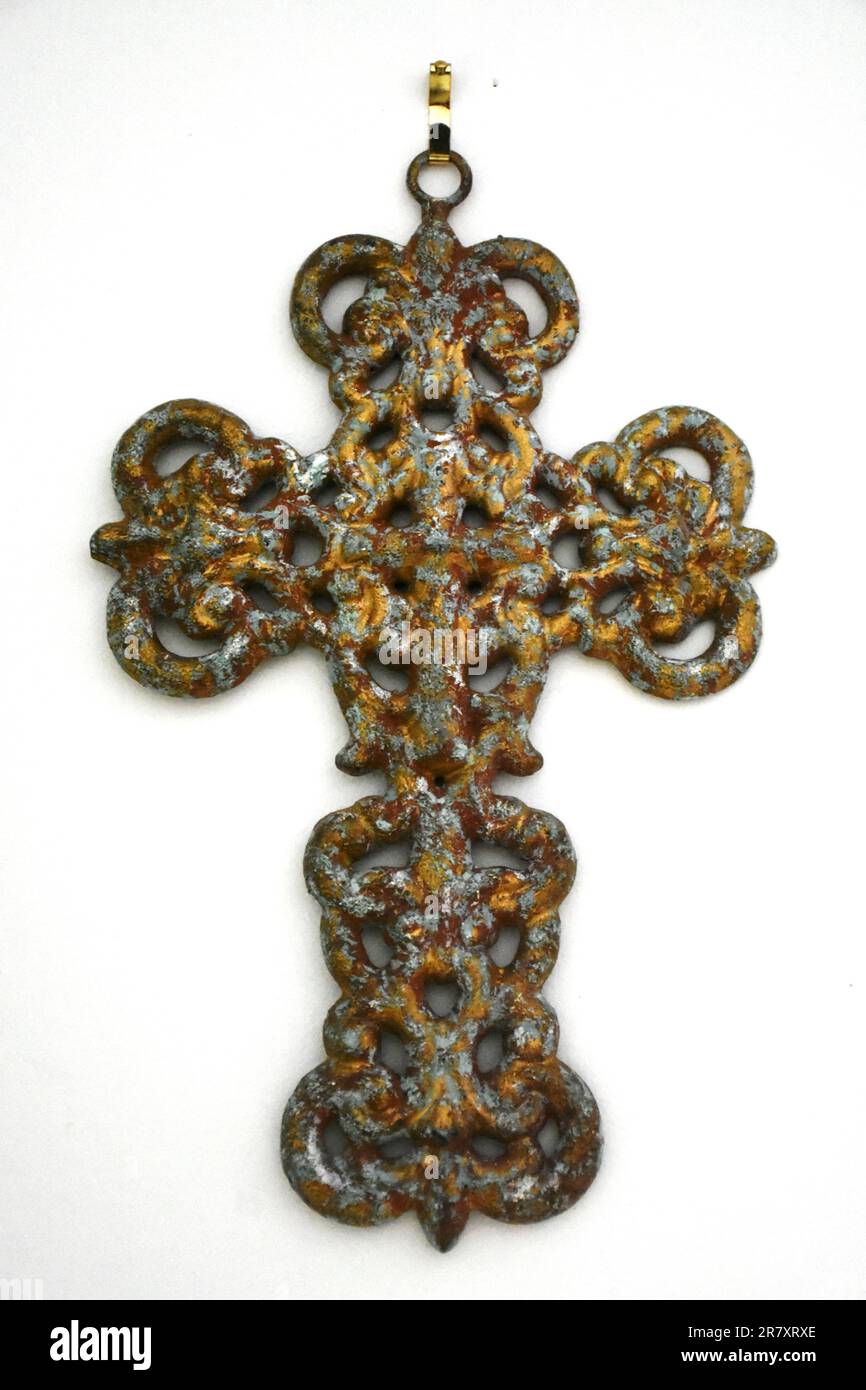 Metal crucifix with varied colours Stock Photo - Alamy