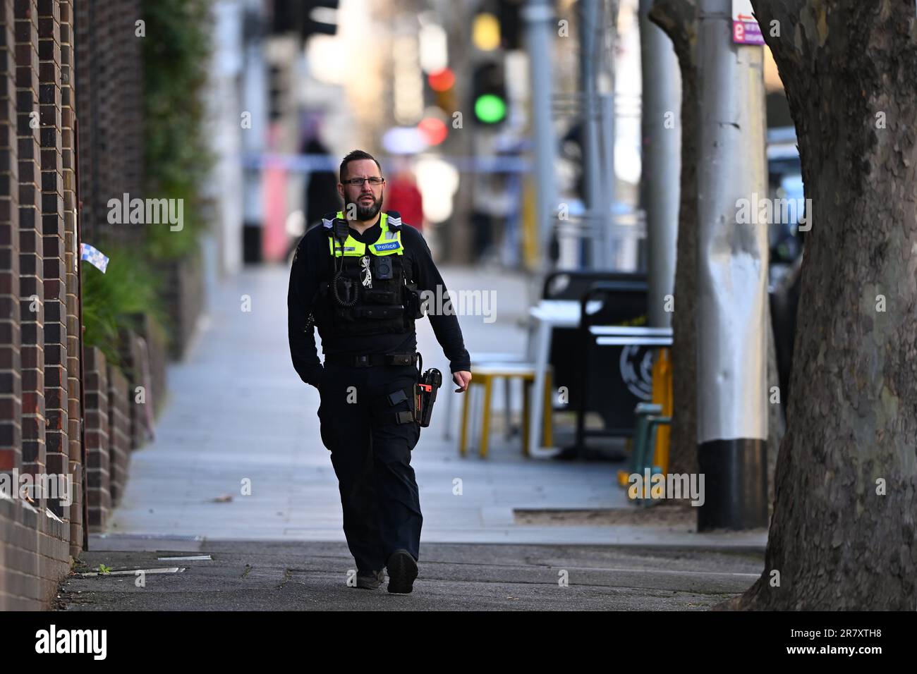 Melbourne, Australia. 18th June, 2023. A Victoria Police officer is ...