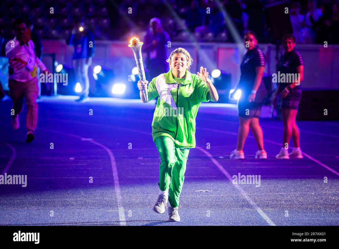 Berlin, Germany. 17th June, 2023. An athlete carries the torch at the ...
